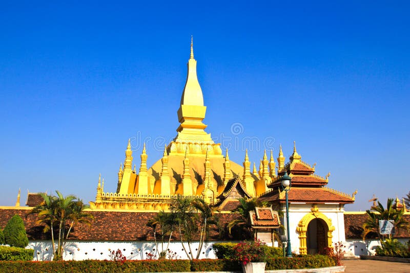 Golden Pagada in Wat Pha that Luang Stock Photo - Image of culture ...