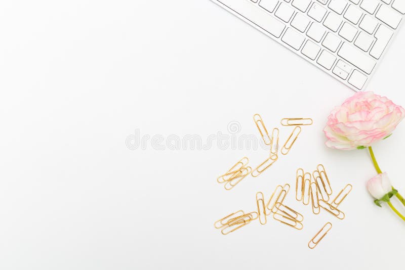 Golden Paper Clips and Keyboard on White Background. Office Copy Stock ...