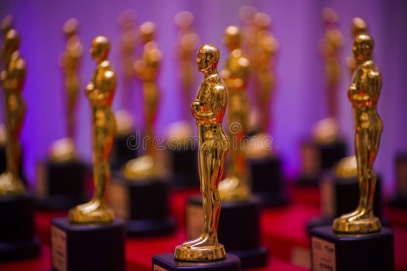 Golden Prize Statues editorial image. Image of glowing - 47733130