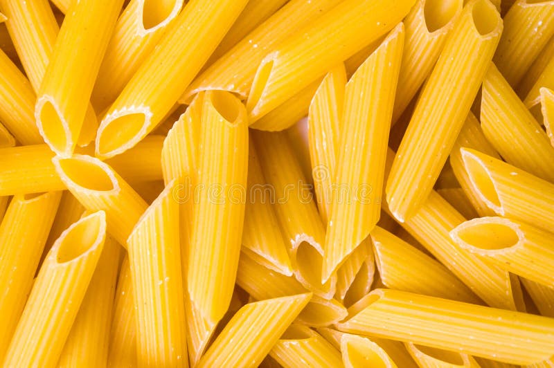 Golden Raw Pasta Background Pattern Stock Photo - Image of penne ...