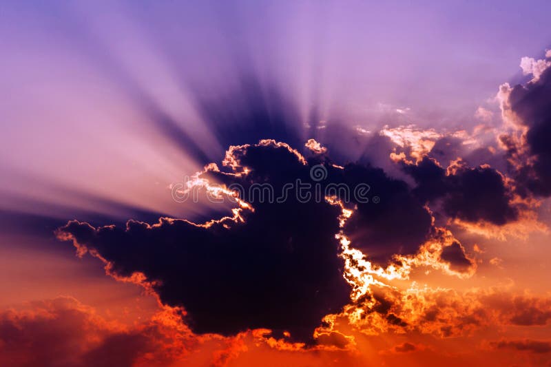 Dramatic Sunset Sky Golden Light Rays Piercing Dark Clouds Stock Photos ...