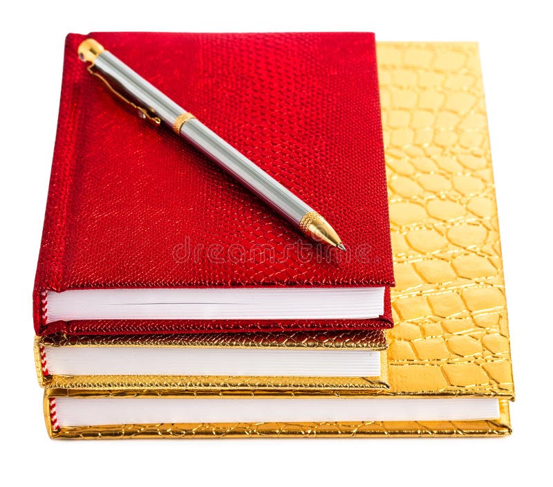 Golden and red notebooks stock photo. Image of golden - 28088748
