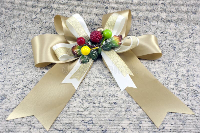 Golden Ribbon on Striped Paper Stock Image - Image of ornate ...