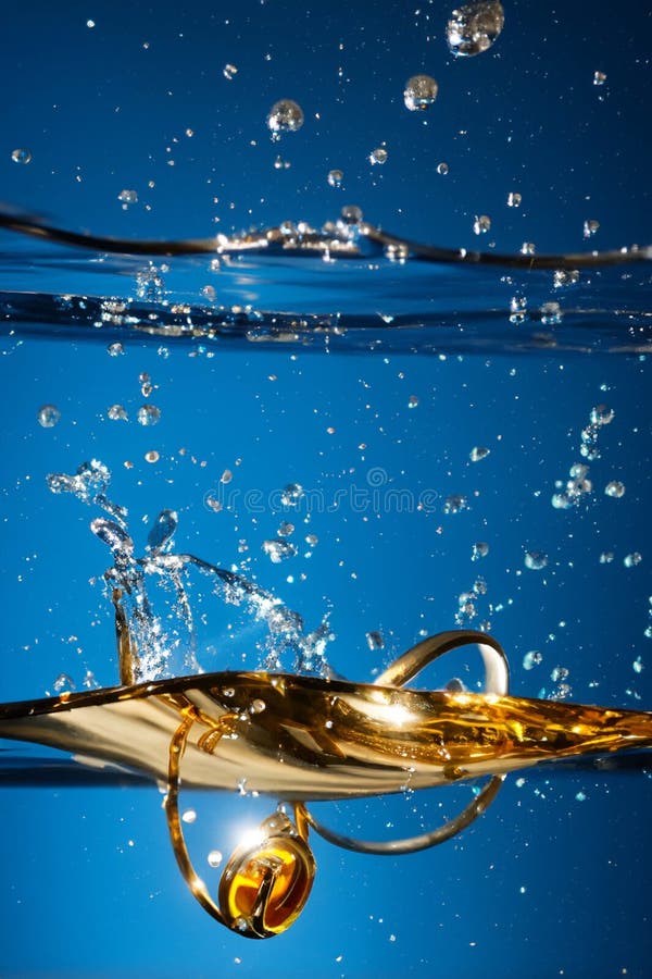 Golden Ring Falling into the Water Stock Illustration - Illustration of ...