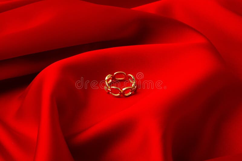 Golden Ring on Red Silk Background Close Up Stock Image - Image of ...