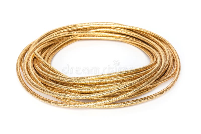 Golden rolled up cord stock photo. Image of twist, line - 261995002