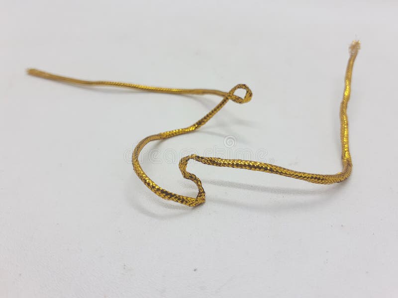 A Golden Rope Accessory on White Isolation Background Stock Photo ...