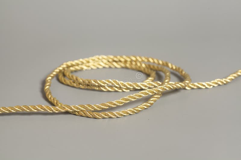 Golden rope stock image. Image of decorative, long, isolated - 59922549