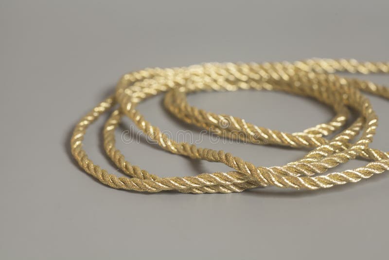 Golden rope stock image. Image of decorative, long, isolated - 59922549