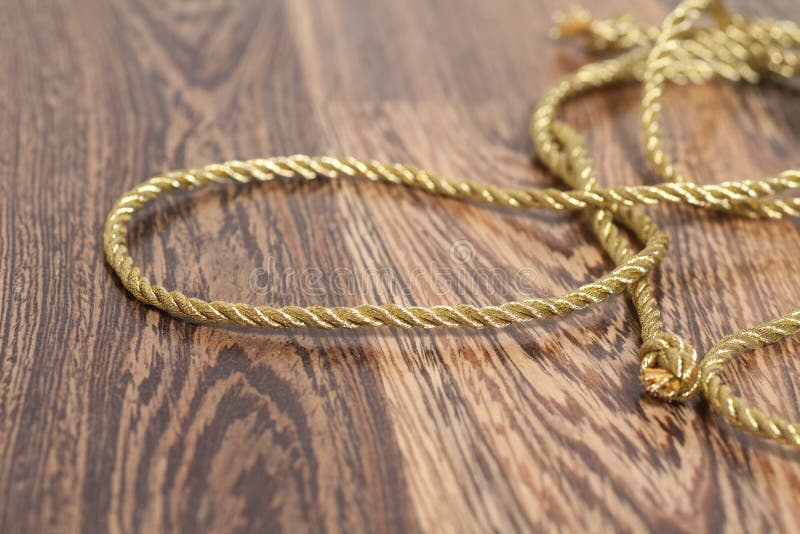 Golden rope stock image. Image of decorative, long, isolated - 59922549