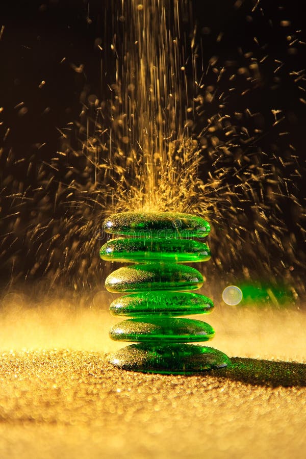 Golden Sand Falling on Balancing Green Stones Stock Image - Image of ...