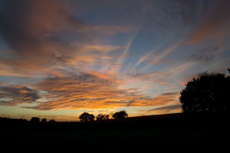 Golden September Sunset Sky Stock Image - Image of clouds, silhouettes ...