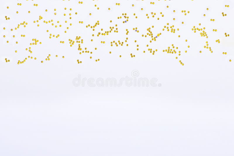 Golden Shiny Particles on a White Background. the Perfect Backdrop for ...