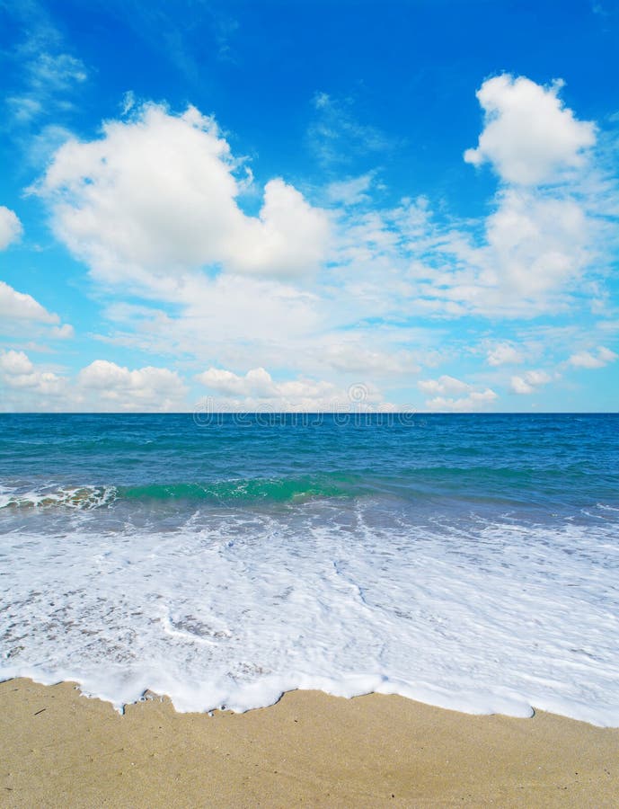 Golden Shore Under a Cloudy Sky Stock Image - Image of seascape, resort ...