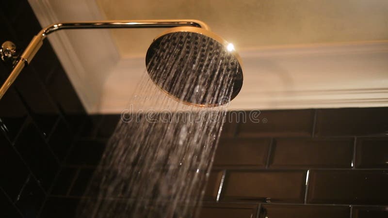 Golden Shower in the Black Bathroom is Turned Stock Footage - Video of ...