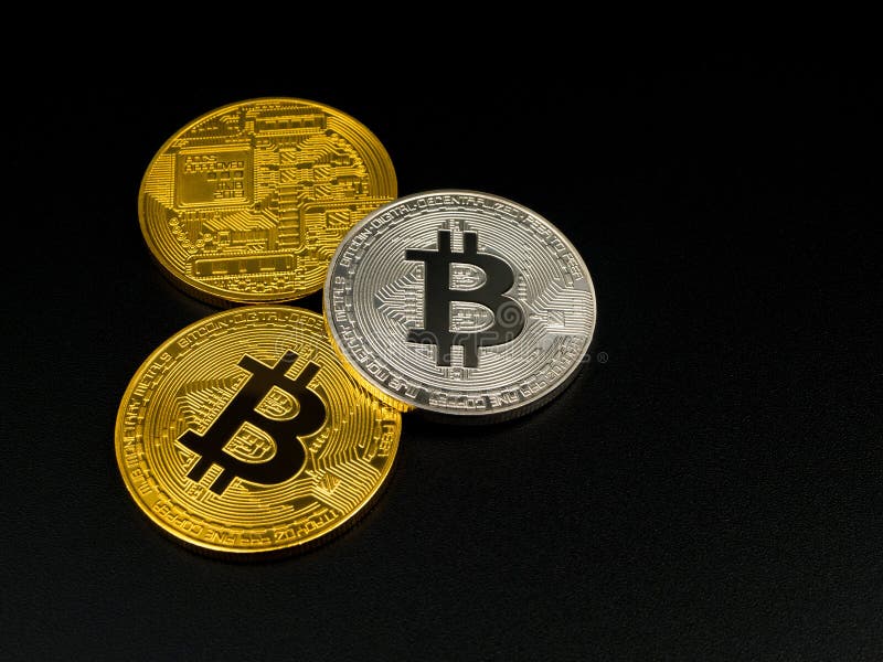 Golden and Silver Bitcoin on Black Background. Bitcoin Cryptocurrency ...