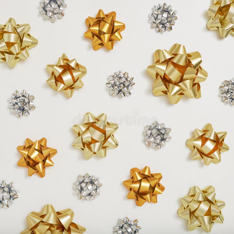 Golden and Silver Decorative Gift Bows on a White Background Stock ...