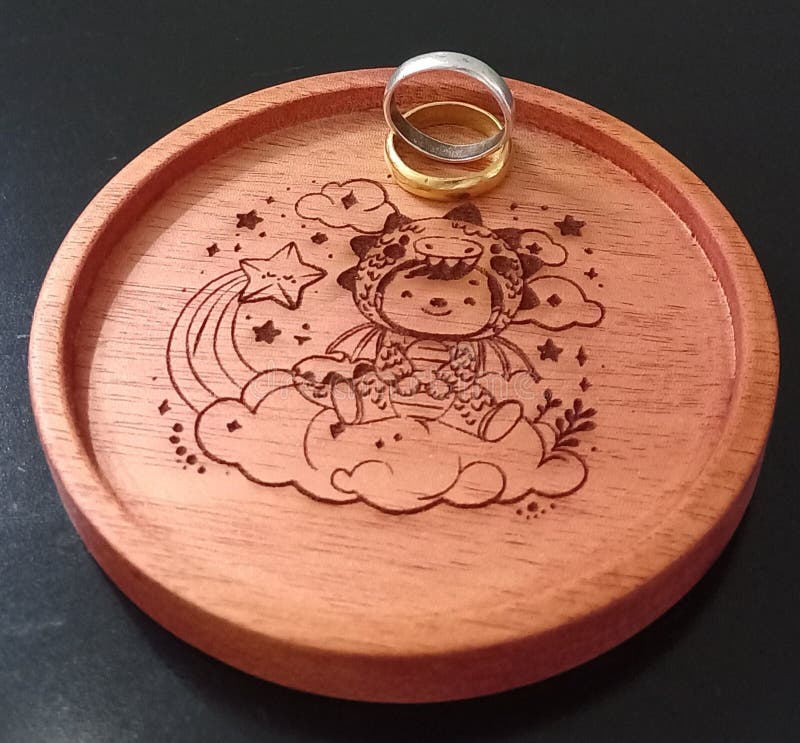 Golden Silver Ring in Wood Plate Stock Image - Image of wood, silver ...