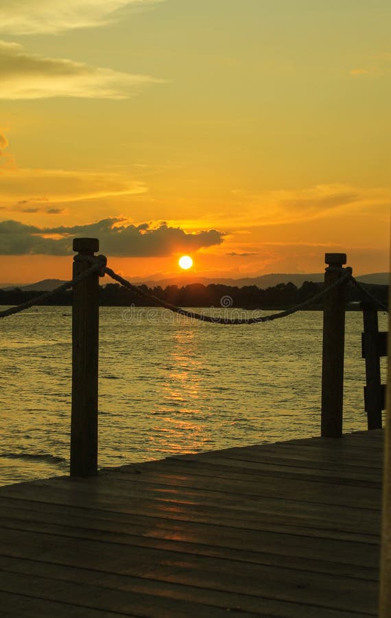 Golden sky at lake sentani stock image. Image of lake - 257888703