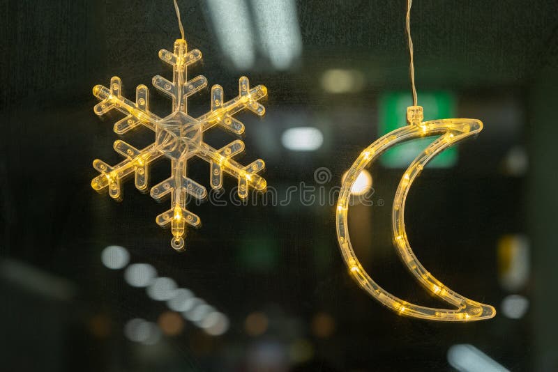 Golden Snow-shaped and Moon-shaped Christmas Decorations Stock Image ...