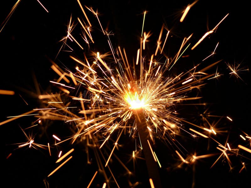 Golden sparkler stock image. Image of explode, candle, black - 566705