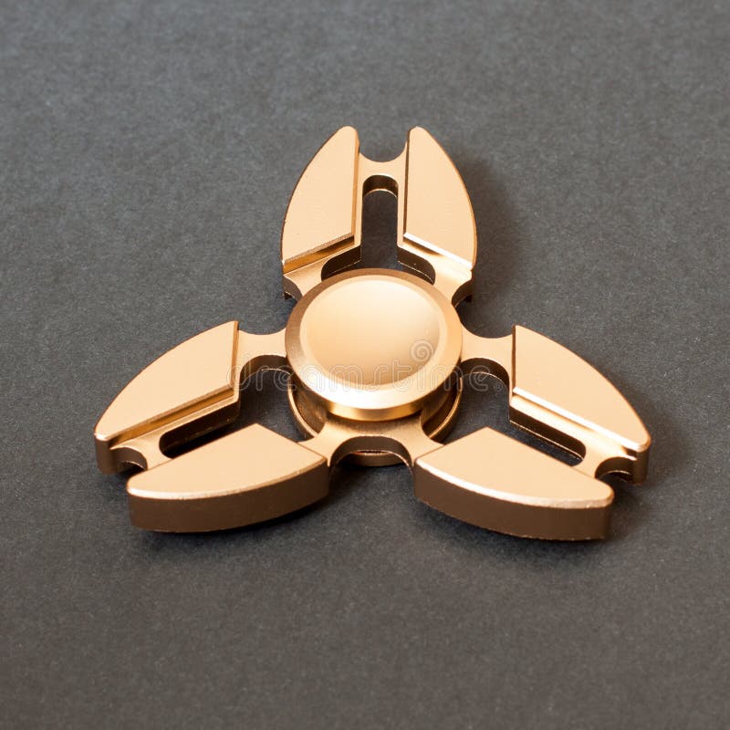 The Golden Spinner is Spinning in His Hand Stock Photo - Image of white ...
