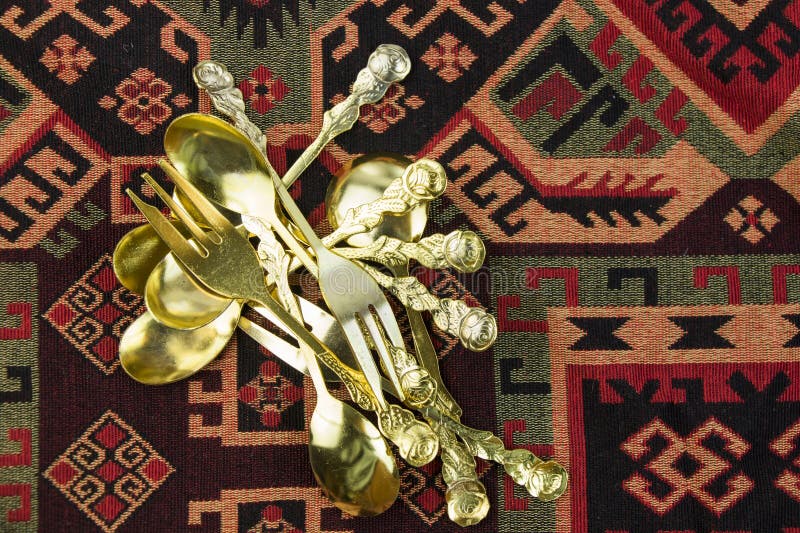 Golden spoons on the table stock image. Image of copy - 273967901