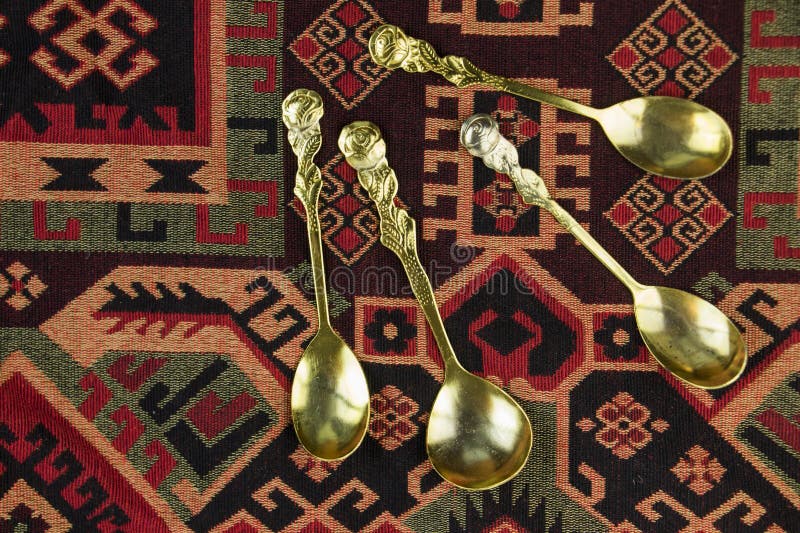 Golden spoons on the table stock photo. Image of rustic - 273967928