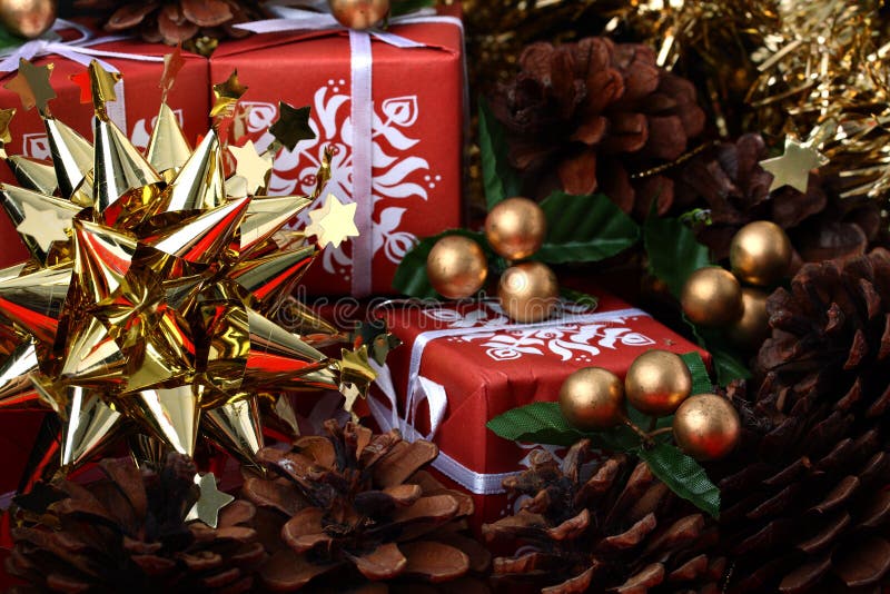 Golden Star with Red Gift Boxes and Fir Cones Stock Image - Image of ...