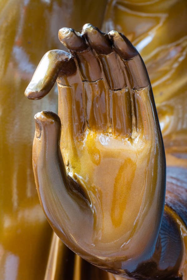 The Golden Statue of Buddha Hand. Stock Photo - Image of peace ...