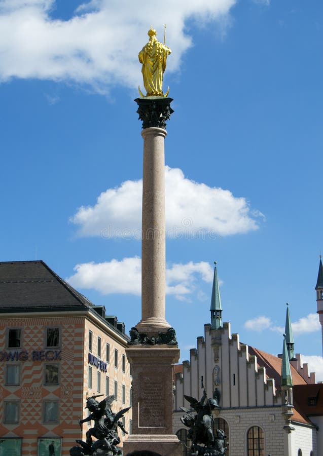 Golden statue on a pillar stock image. Image of historical - 57484667
