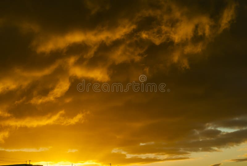 Golden Storm Clouds stock photo. Image of illuminated - 50697394