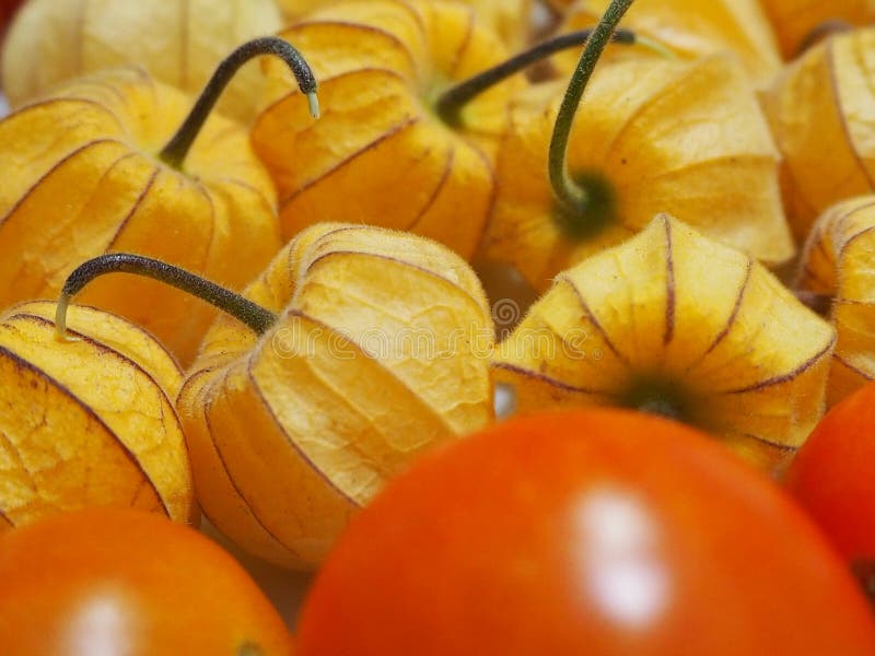 Golden Strawberry and Cherry Tomato Together Stock Image - Image of ...