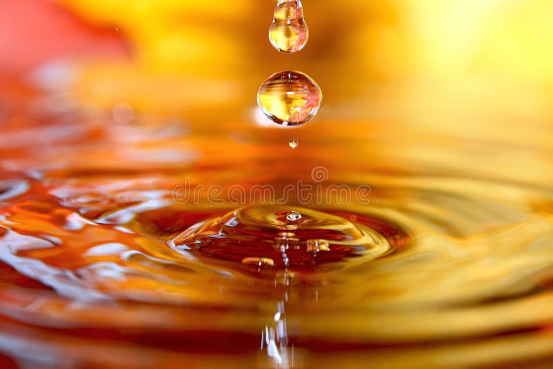 Golden liquid stock photo. Image of detail, water, liquid - 574254