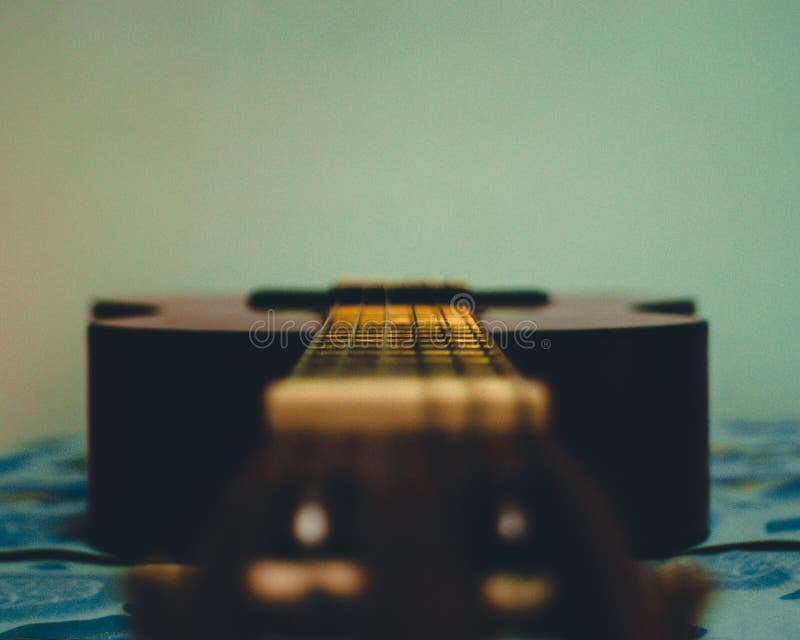 Golden Strings Classical Guitar Stock Photo - Image of golden, wood ...