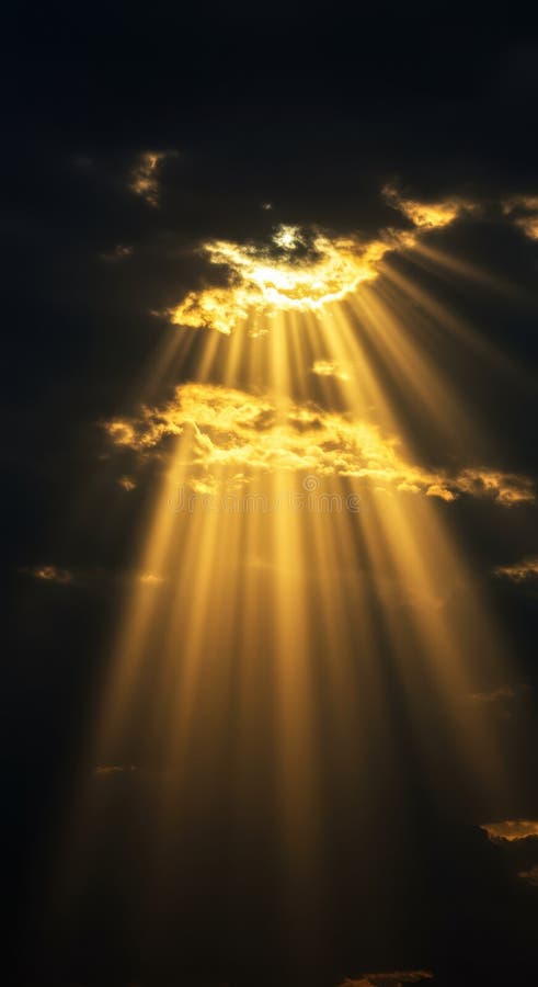 Golden Sun Rays Breaking through Dramatic Clouds at Sunset Stock Image ...
