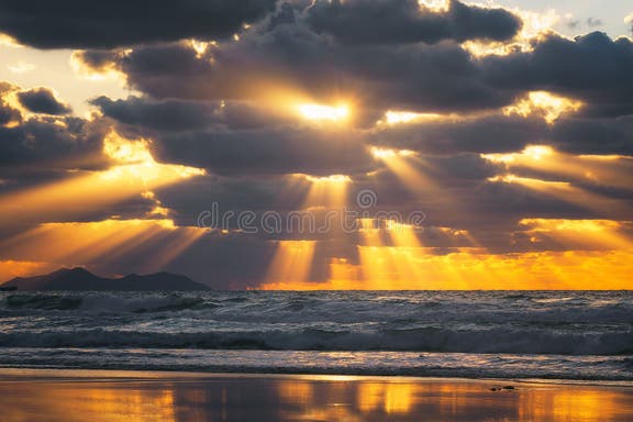 Golden Sun Rays on the Sea at Sunset Stock Image - Image of dramatic ...