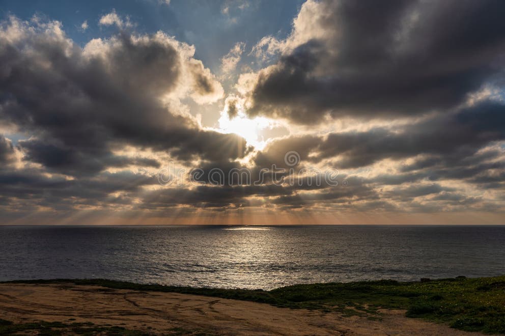 Sunlight Beaming through Dramatic Clouds Stock Image - Image of natural ...