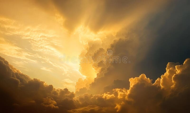 Golden Sunlight Streaming through Thick Clouds during a Dramatic Sunset ...