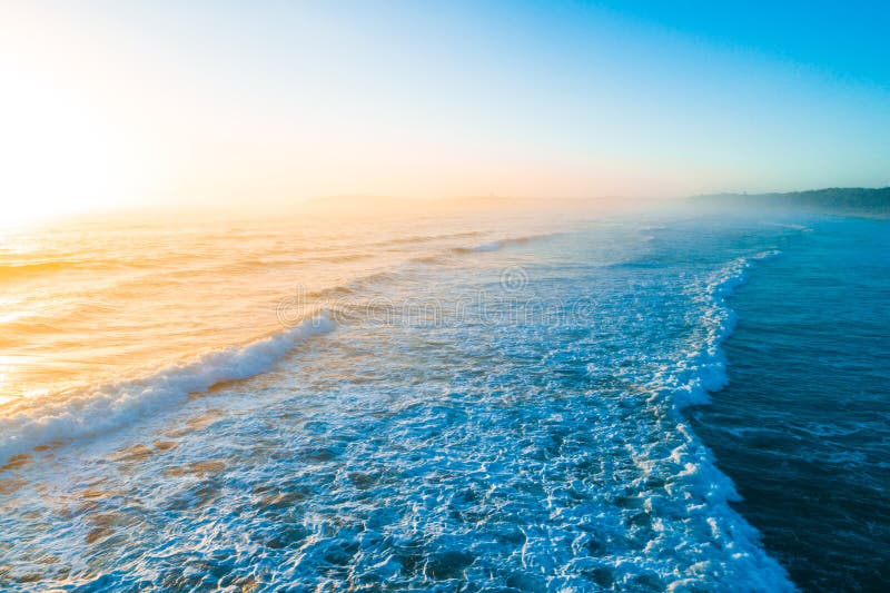 Golden Sunrise Over Blue Ocean Waves. Stock Image - Image of outdoor ...