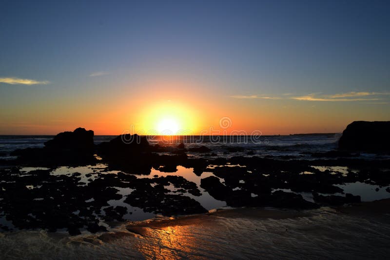 Golden Sunset at a Beach with Rocks and Rock Pools Stock Image - Image ...