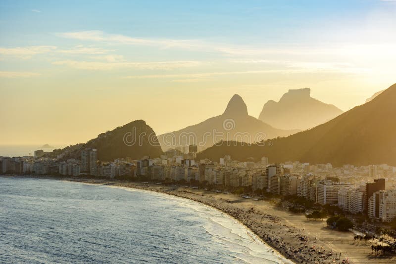 Golden Sunset between Copacabana Buildings Stock Image - Image of hills ...