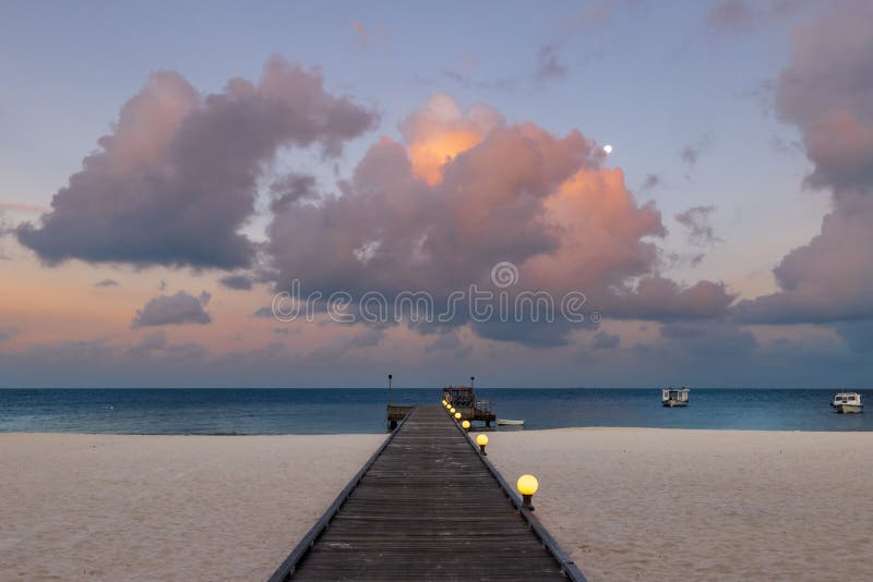 Golden Sunset Over the Beach with a Boardwalk Stock Photo - Image of ...
