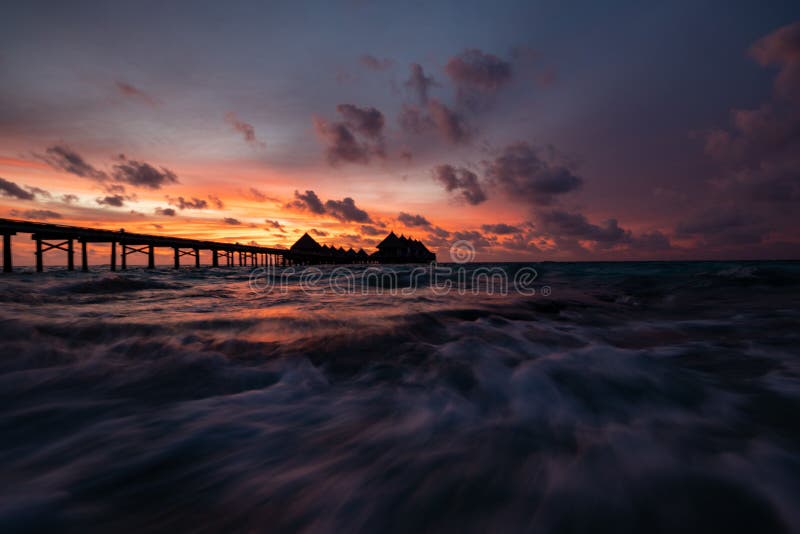 Golden Sunset Over the Beach with a Boardwalk Stock Photo - Image of ...