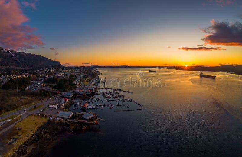 Golden Sunset Over the Ocean and a Village Editorial Stock Image ...