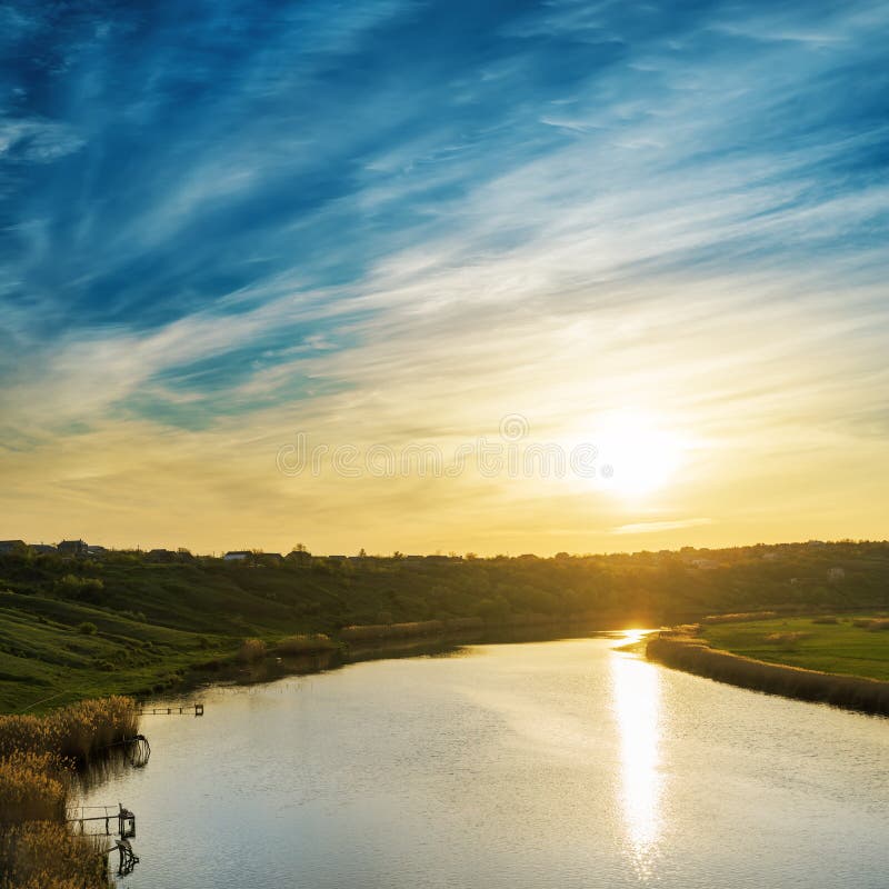 Golden Sunset Over River with Reflections Stock Image - Image of coast ...