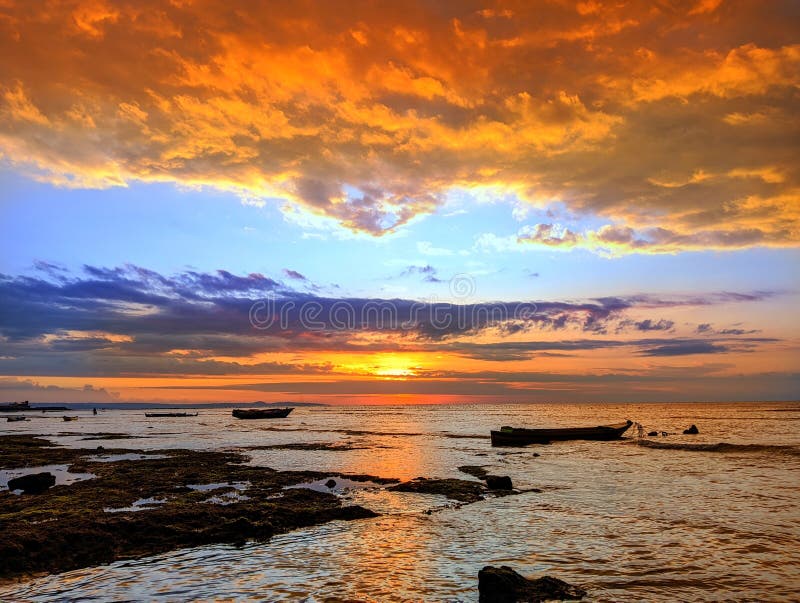 Golden Sunset or Sunrise with Heavy Clouds on Tropical Beach Stock ...