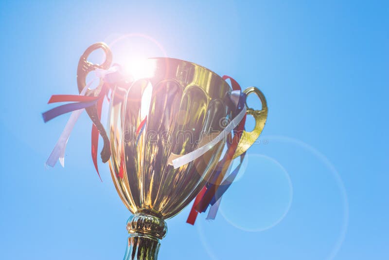 Golden Trophy and Blue Background Stock Image - Image of championship ...