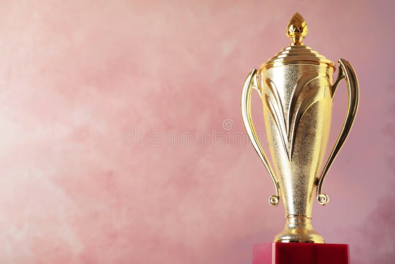 Golden Trophy Cup with Confetti Stars on Pink Background Stock Image ...