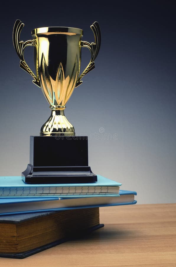 Golden Trophy on Stack of Book for Education Success Concept Stock ...